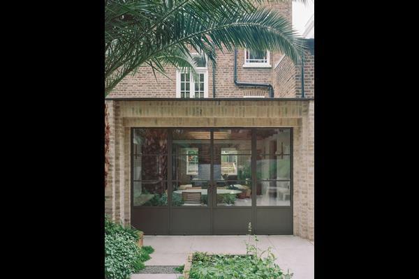 In pictures: Threshold House – Studio McW’s sharp steel and brick ...